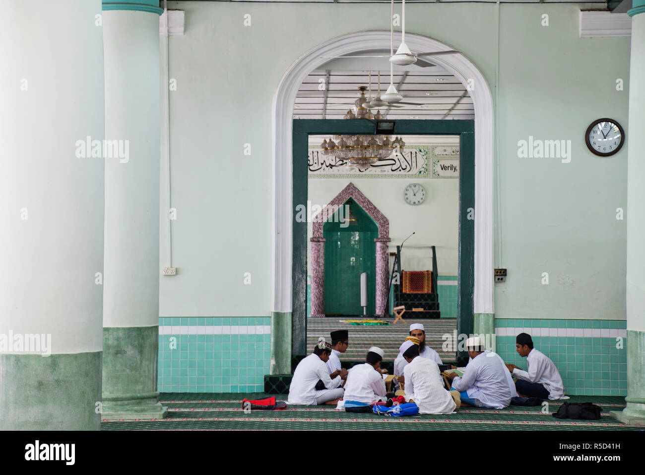 Singapore, Jamae (Chulia) Mosque, Children Studying the Koran Stock ...