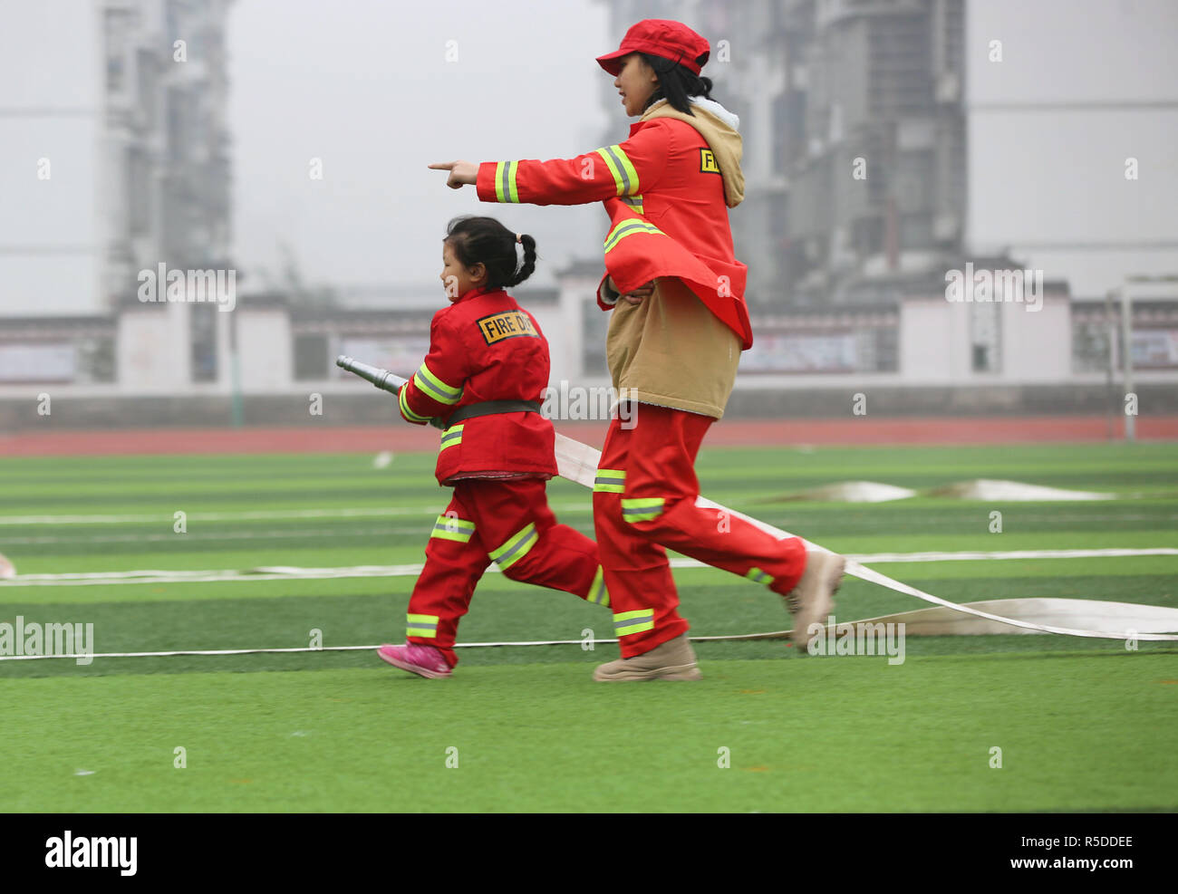 Zhangjiajie, Hunan Province, China. 1st Dec, 2018. A child and her ...
