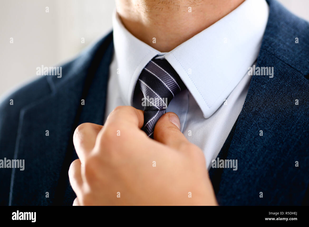 Put his tie straight hi-res stock photography and images - Alamy