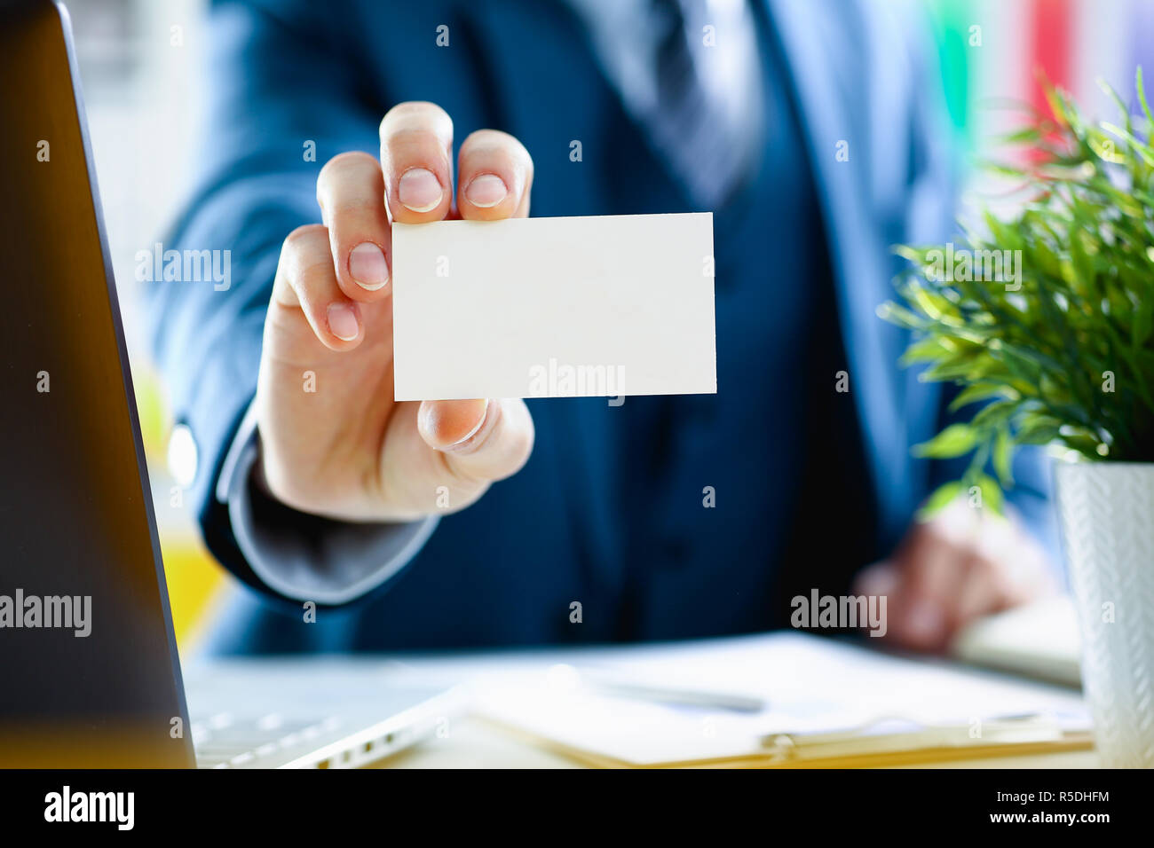 Male arm in suit give blank calling card Stock Photo - Alamy