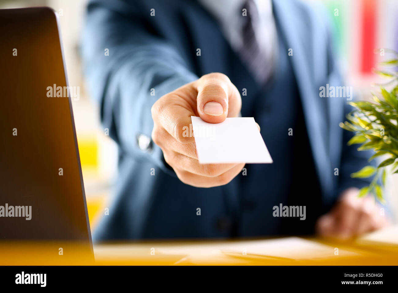 Male arm in suit give blank calling card Stock Photo - Alamy