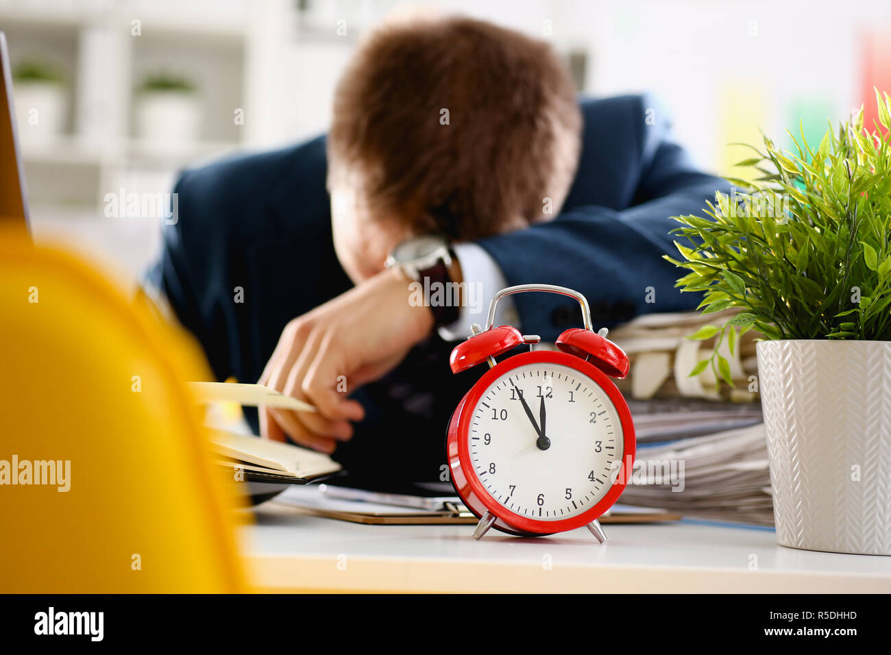 Businessman shows clock hi-res stock photography and images - Alamy