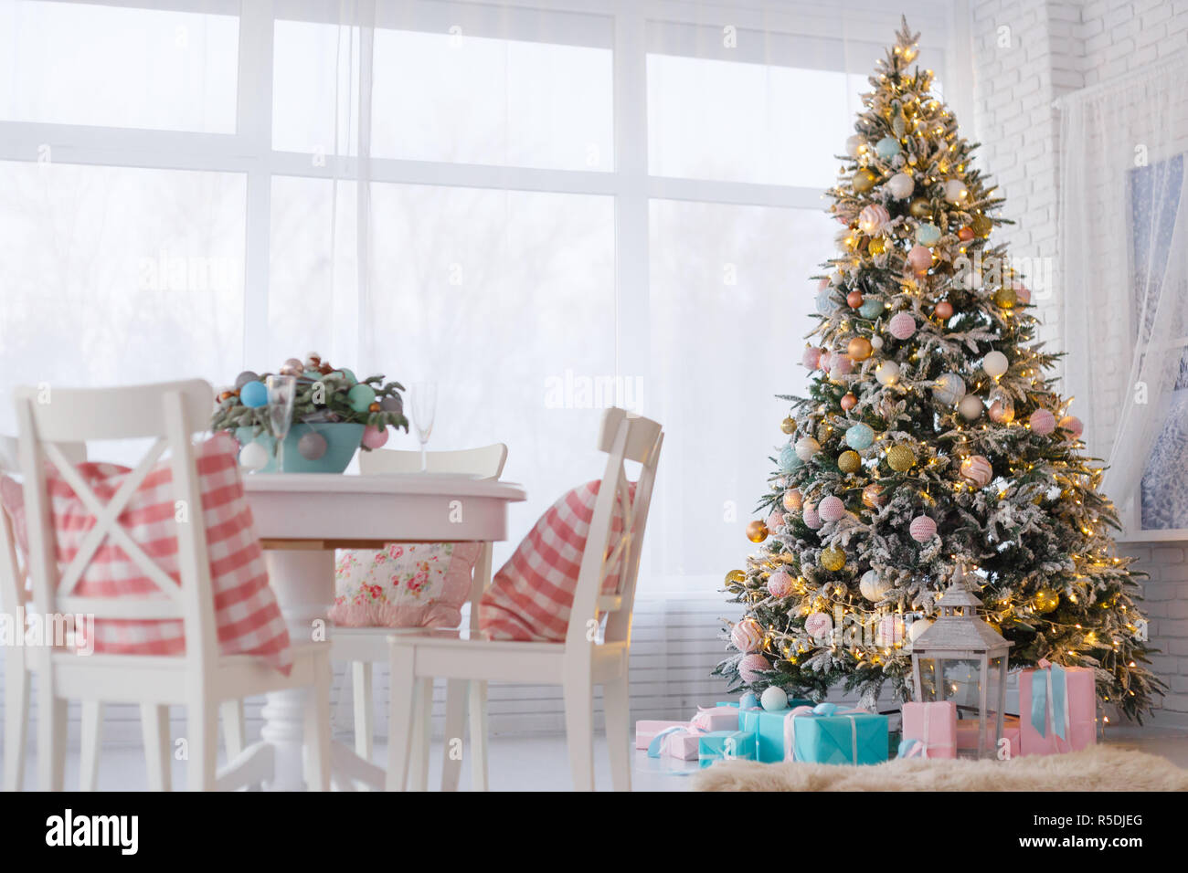 Christmas tree in the living room Stock Photo - Alamy
