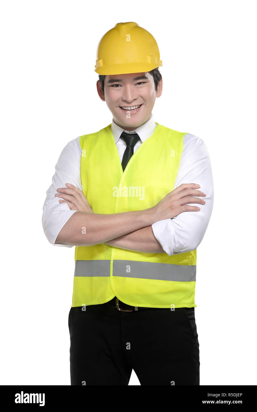 Asian worker wearing safety vest and yellow helmet Stock Photo - Alamy