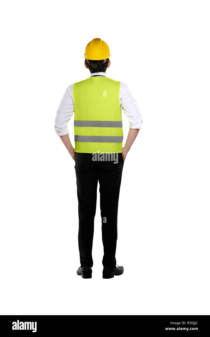 Back view of asian worker wearing safety vest and yellow helmet Stock ...