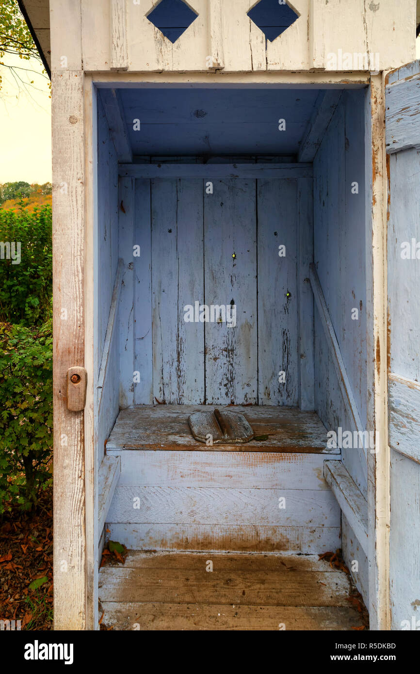 Rural outbuildings. A typical old fashioned WC, outhouse on an old farm ...