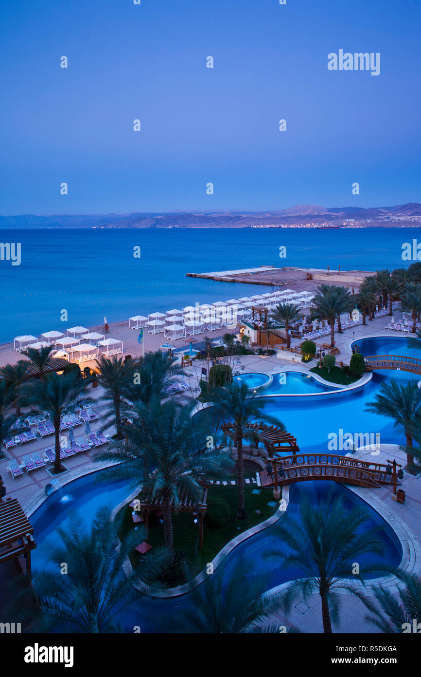 Jordan, Aqaba, elevated view over hotel swimming pool and Red Sea Stock ...