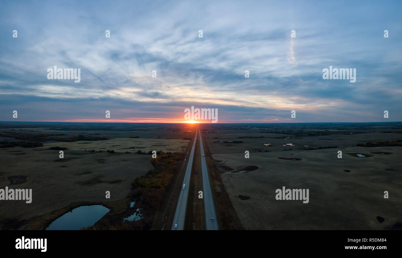 Aerial panoramic view of the Highway in the Prairies during a vibrant ...