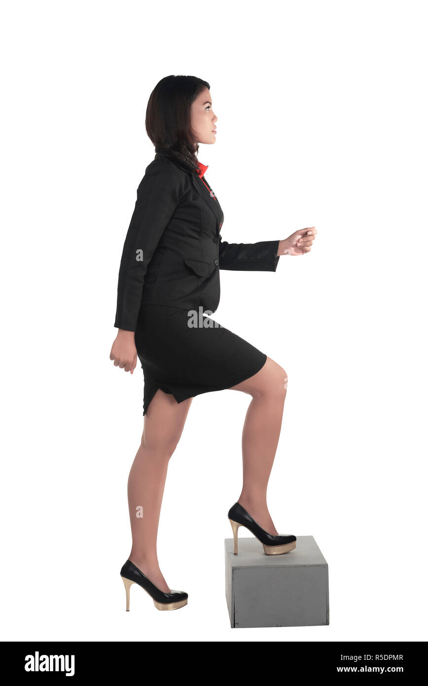 Business woman step up Stock Photo - Alamy