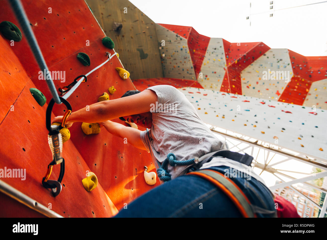 Active lifestyle and bouldering climbing, reaching the top concept ...