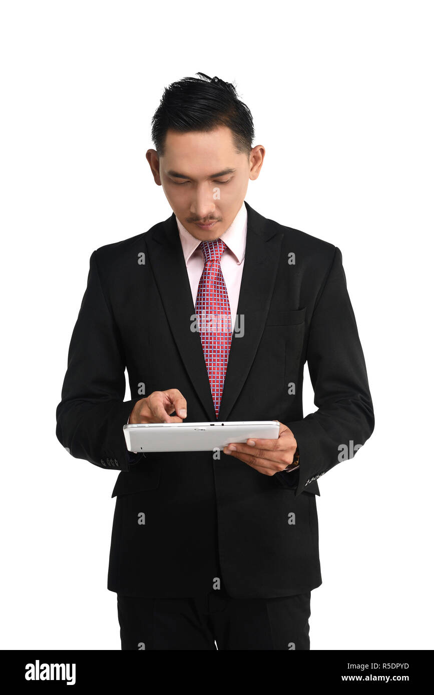 Business Man Holding Computer Tablet Stock Photo - Alamy