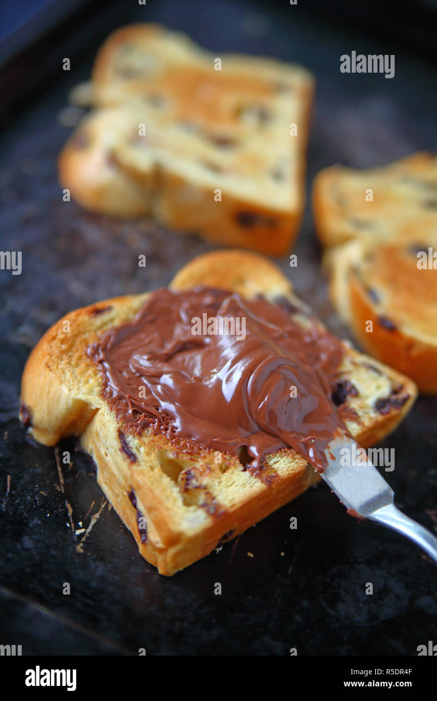 Brioche slices with chocolate spread Stock Photo - Alamy