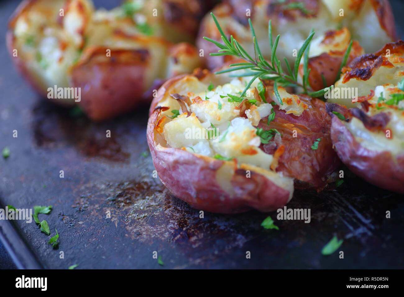 Closeup smashed red potatoes Stock Photo - Alamy