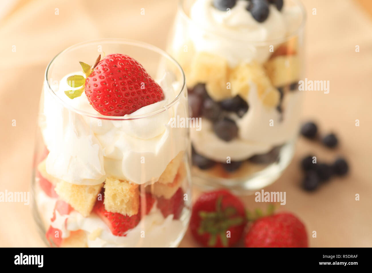 Individual fresh berry trifles Stock Photo - Alamy