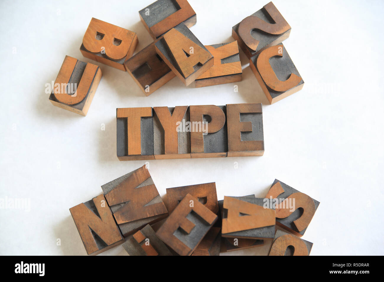 Type word with assorted wood letters Stock Photo - Alamy