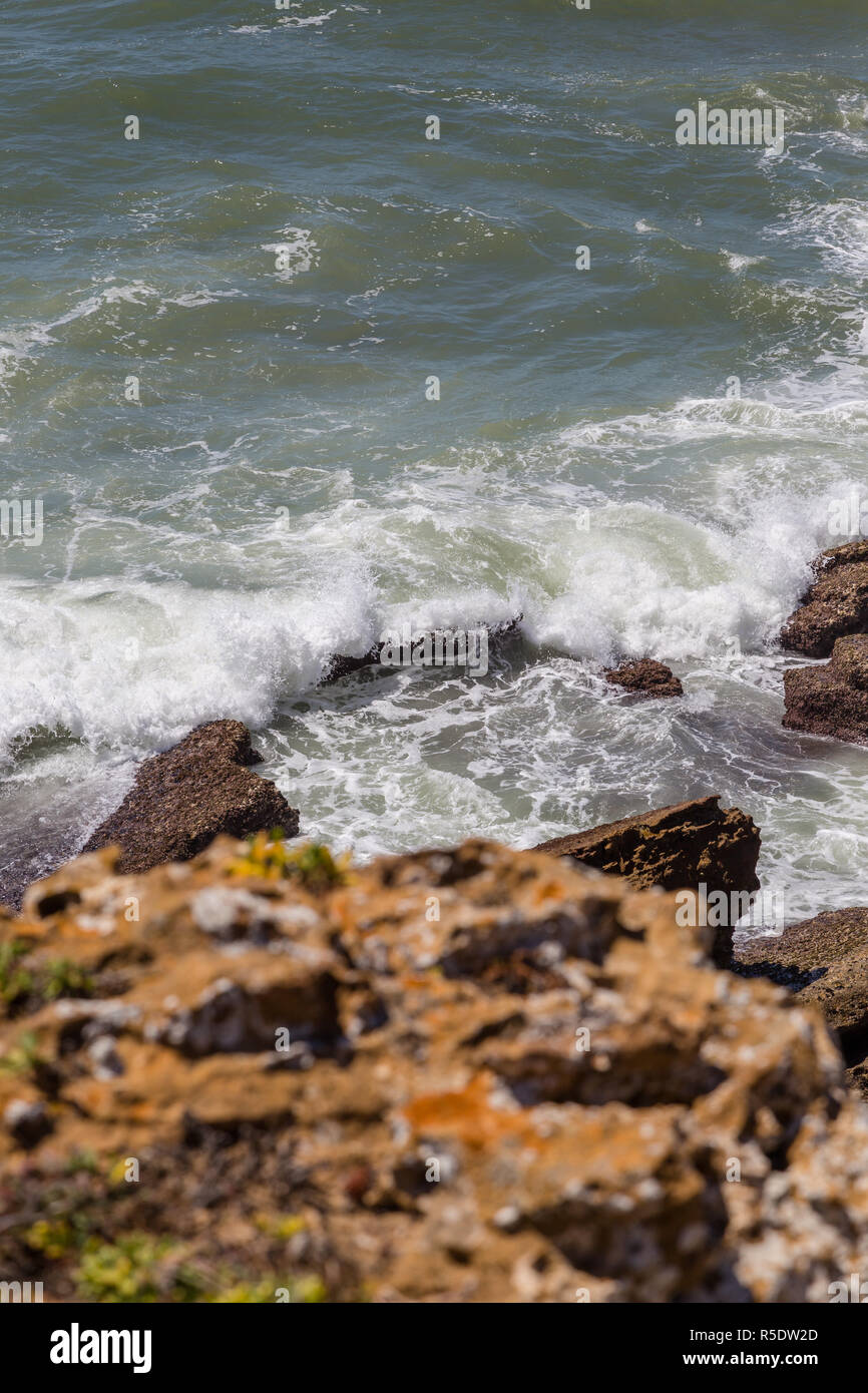 view on coast line rocks in ocean Stock Photo - Alamy