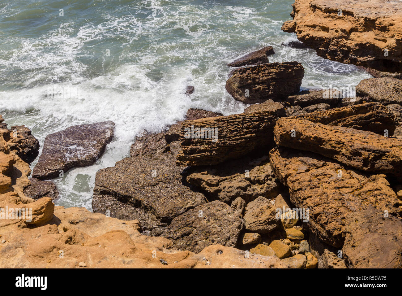 view on coast line rocks in ocean Stock Photo - Alamy