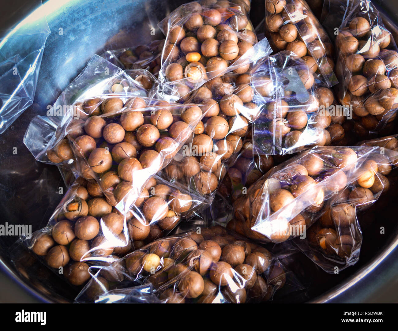 macadamia nuts in package plastic bag for sale in the local market ...