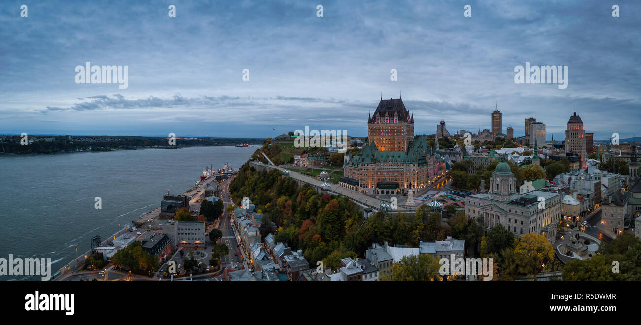 Aerial panoramic cityscape of a historic city during a vibrant cloudy ...