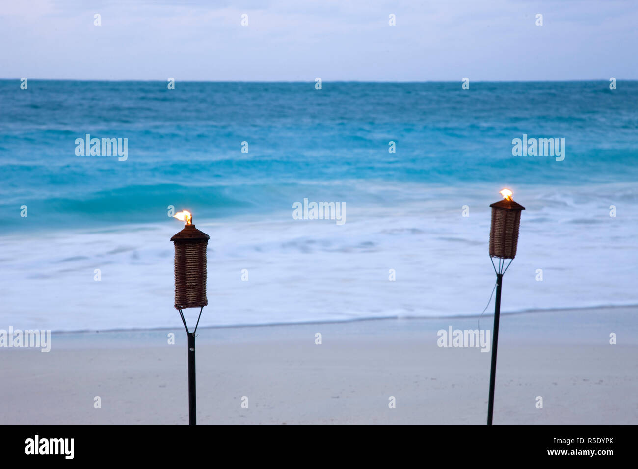 Torches on beach, Grace Bay, Providenciales, Turks and Caicos Stock ...