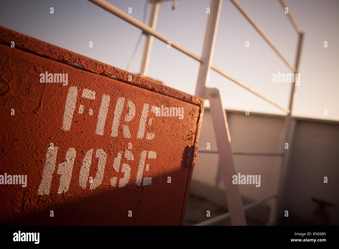 Fire hose on a ship Stock Photo - Alamy