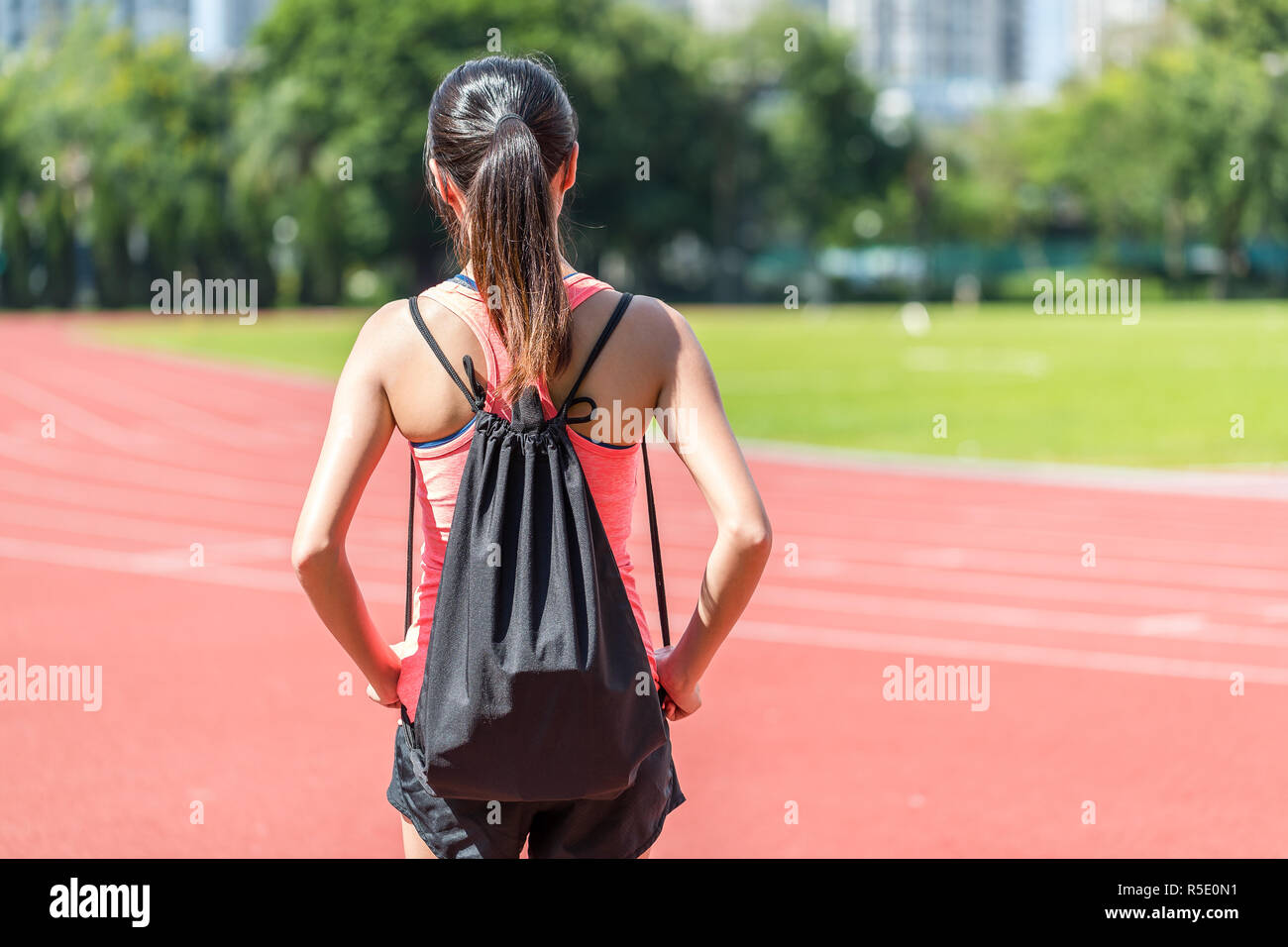 Sport woman in sport stadium Stock Photo - Alamy