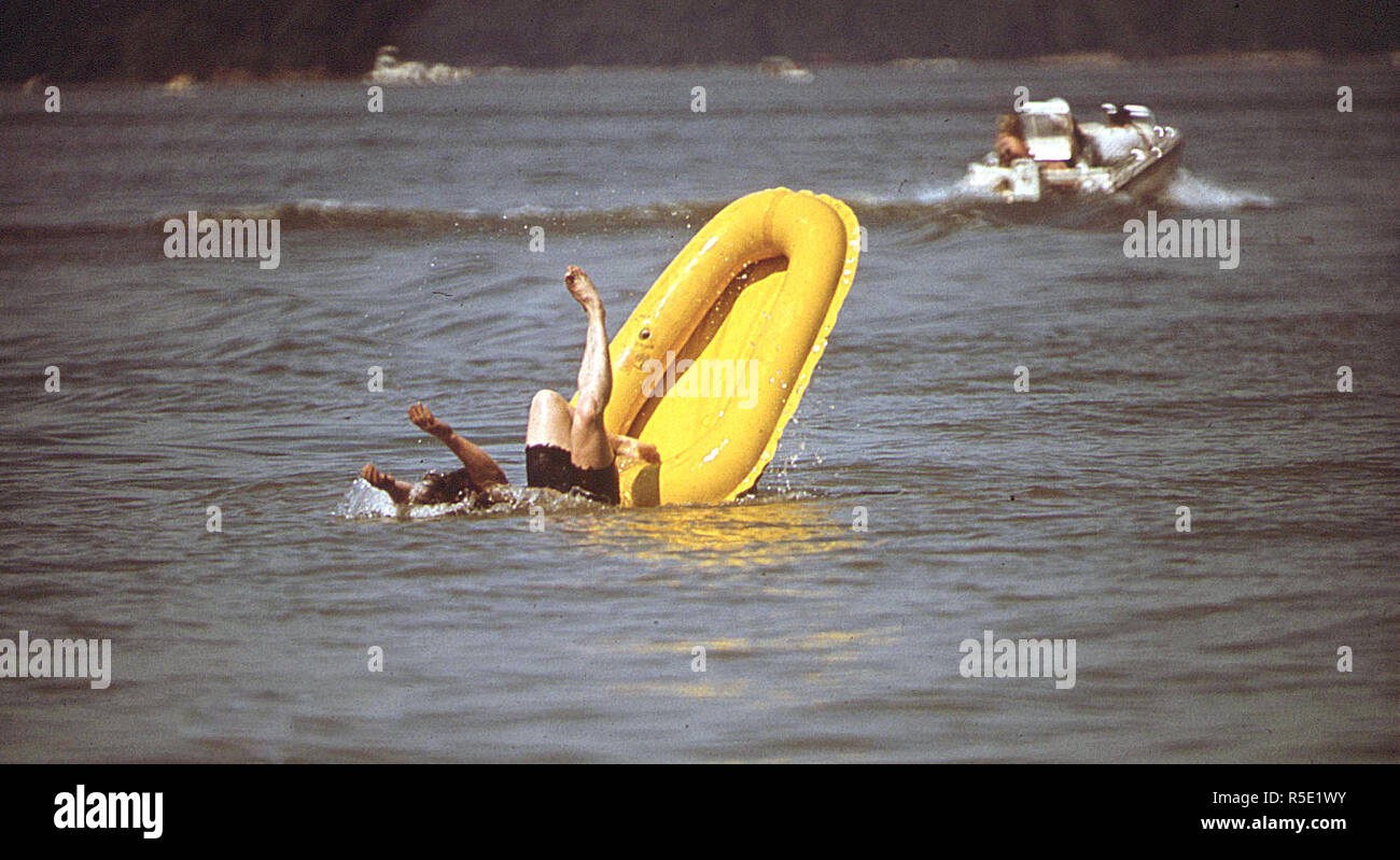 Man falling off raft hi-res stock photography and images - Alamy