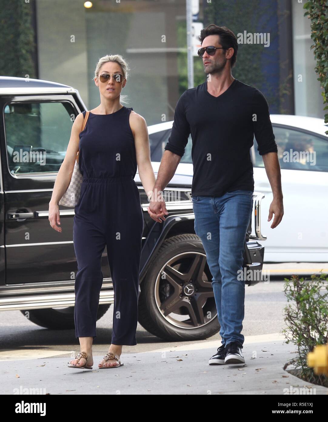 UFC host Caroline Pearce holds hands with her boyfriend Jason Shane ...