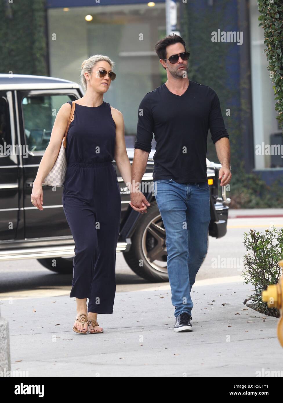 UFC host Caroline Pearce holds hands with her boyfriend Jason Shane ...