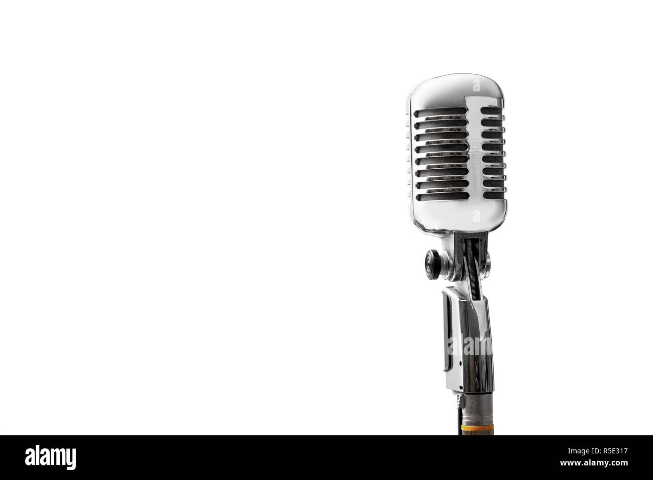 Vintage retro microphone isolated on white background Stock Photo - Alamy