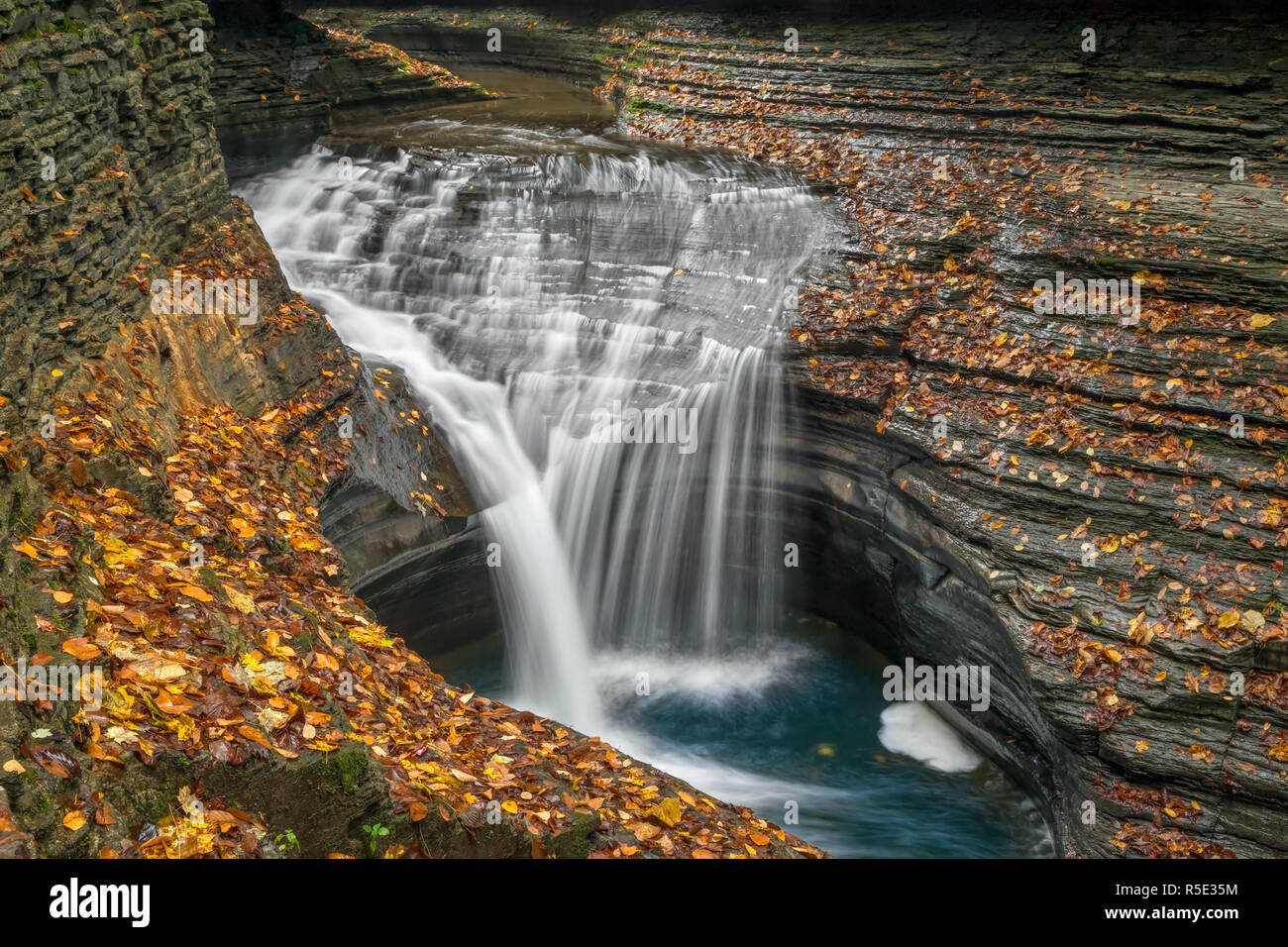 The first drop in a series of waterfalls called The Triple Cascade ...