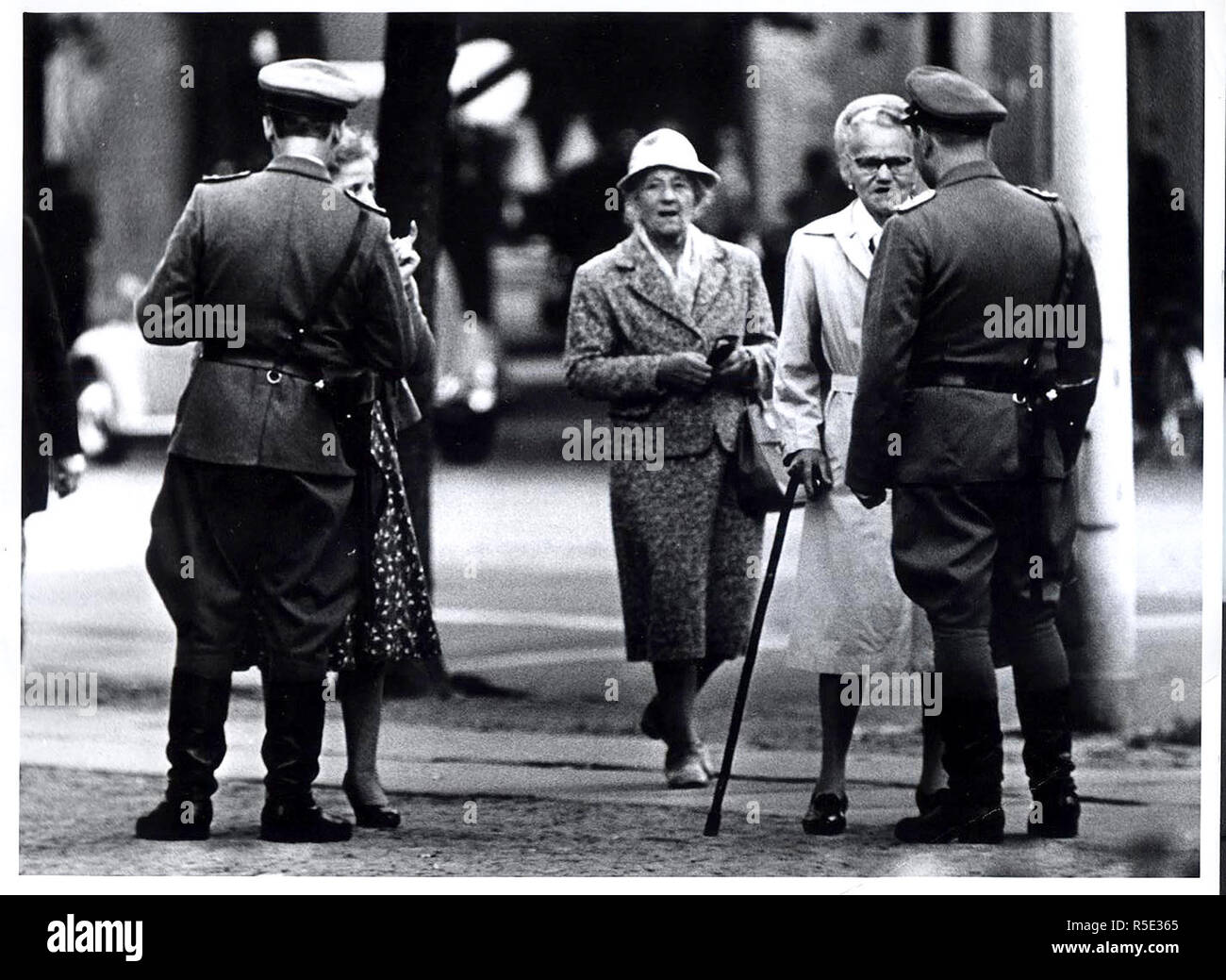 August 1961 - Two "Vopos" (East German Police) Check East Berliners ...