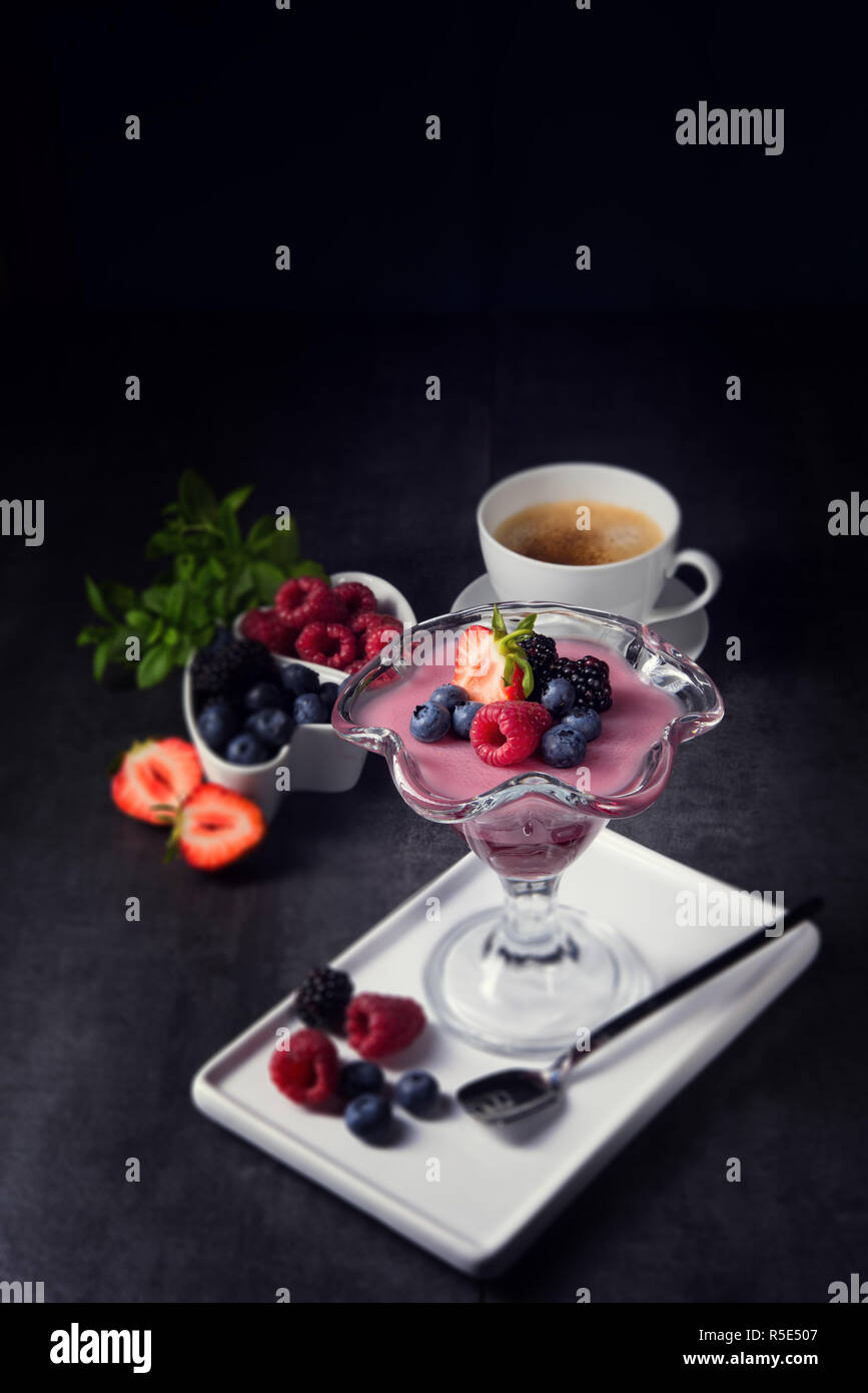 delicious pudding with wild berry Stock Photo - Alamy