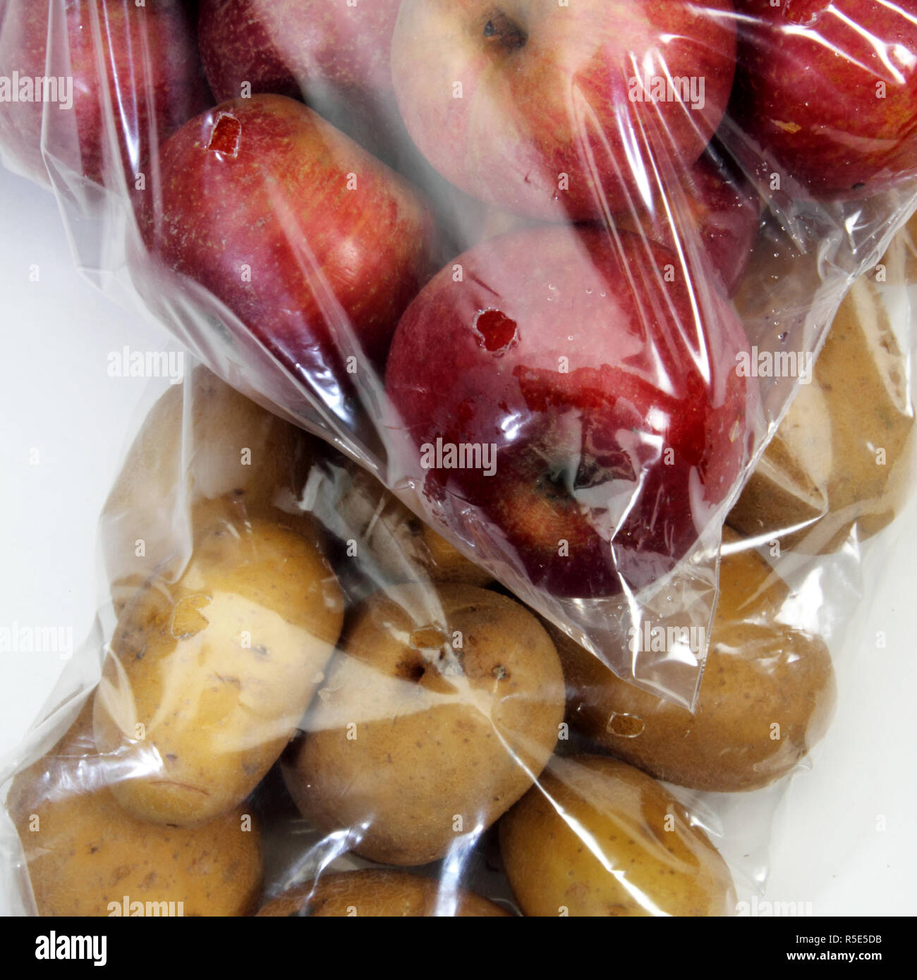 Apples In Plastic Packaging Bags High Resolution Stock Photography and ...
