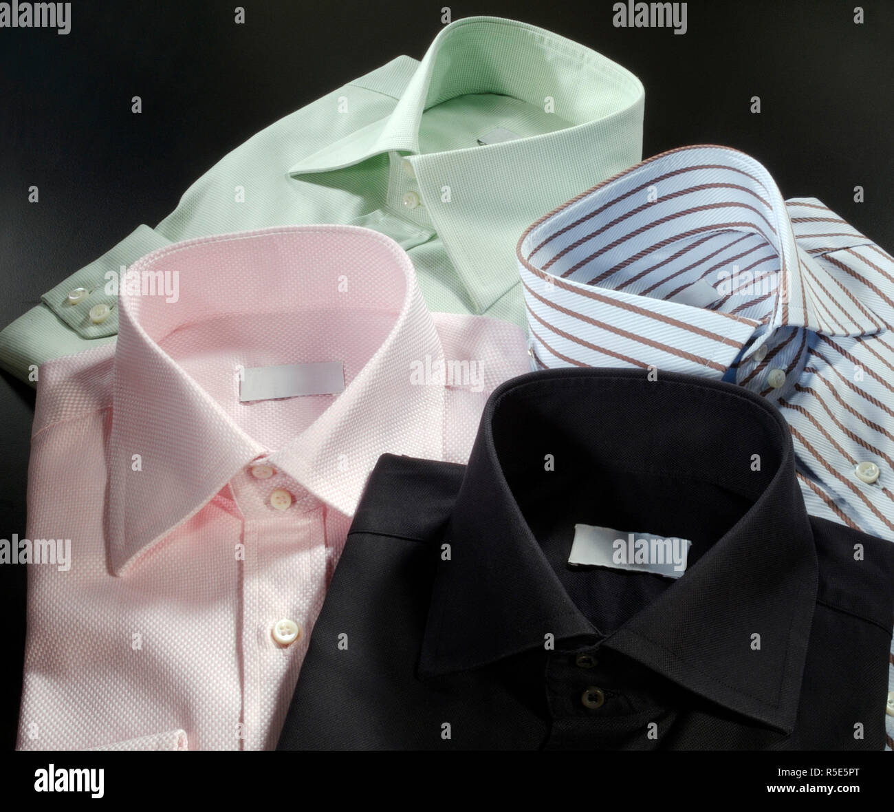 four men's shirts Stock Photo - Alamy