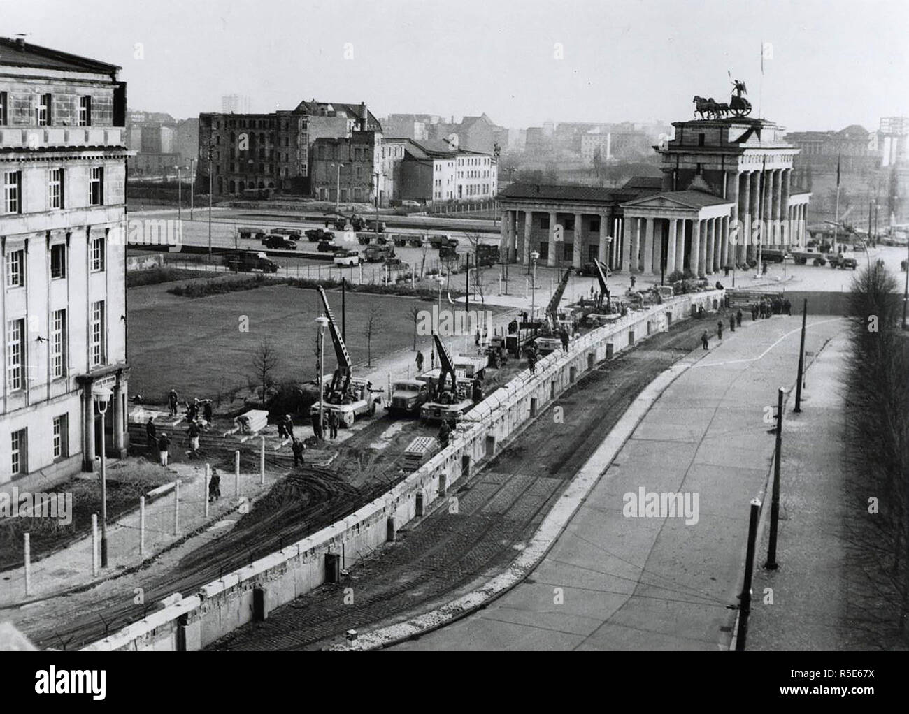 Berlin wall reinforced. Under the watchful eye of Communist police ...