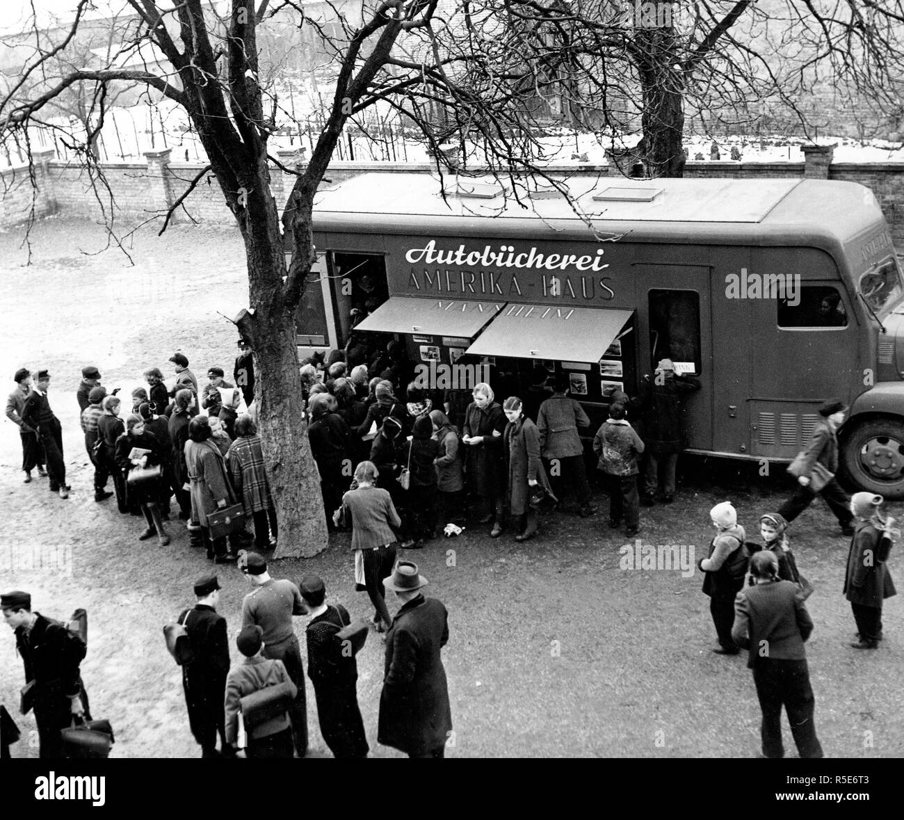 Original caption: The first bookmobile of Amerika Haus began in 1952 to ...