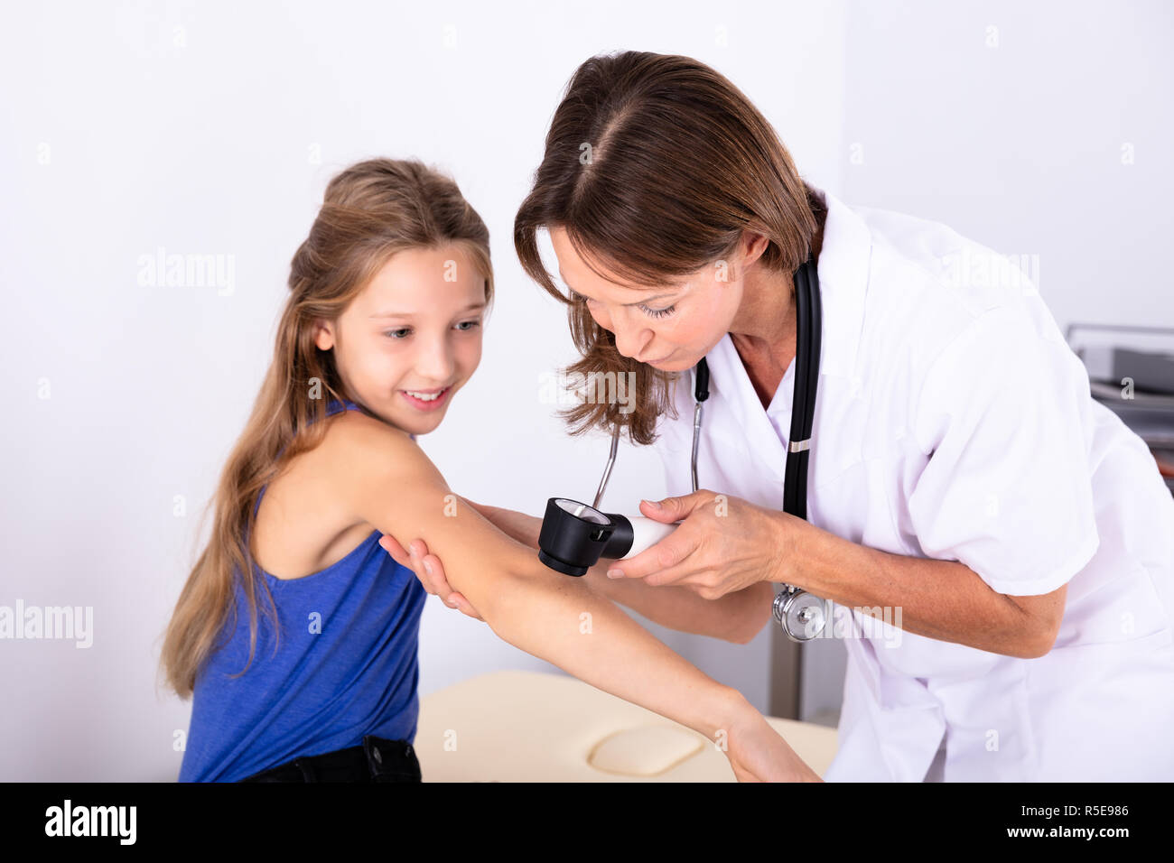 Skin examination dermatologist hi-res stock photography and images - Alamy