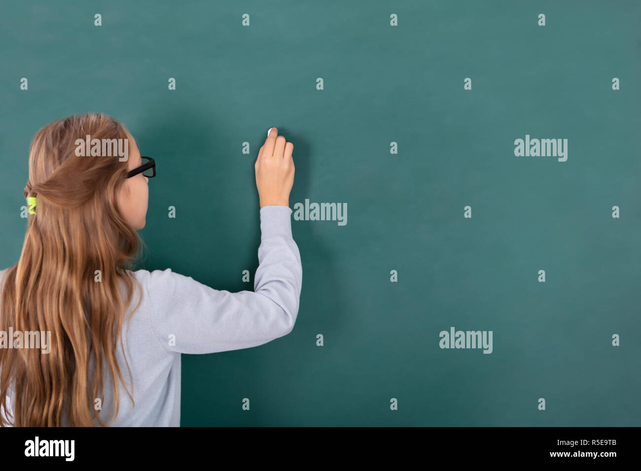 Child chalk writing hi-res stock photography and images - Alamy