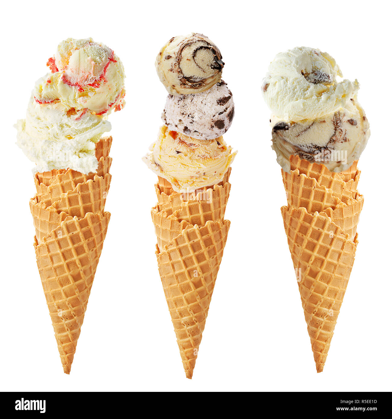 Variety of ice cream scoops in cones with chocolate, vanilla and ...