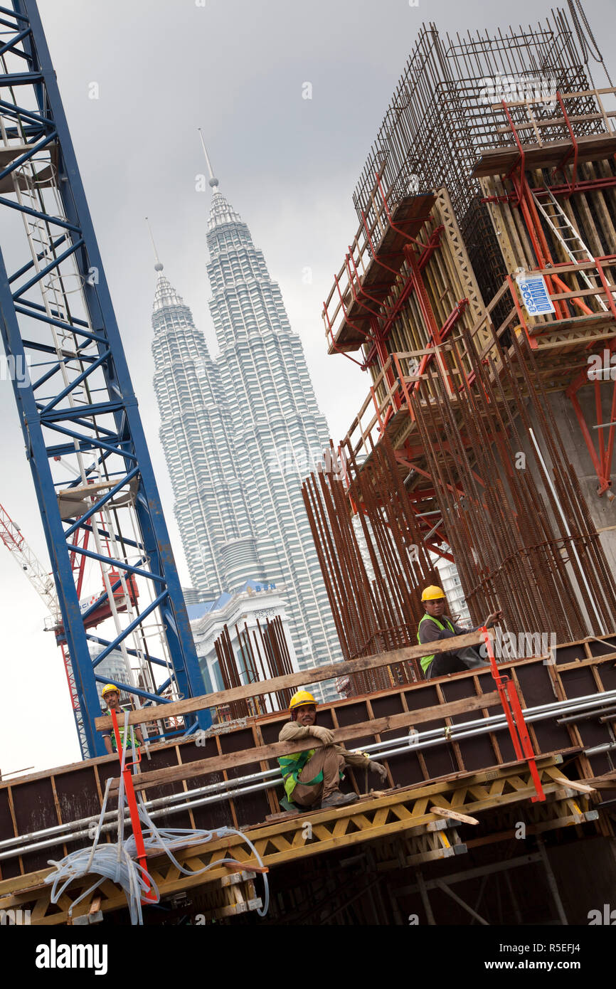 Construction site with Petronas Towers behind, Kuala Lumpur, Malaysia ...