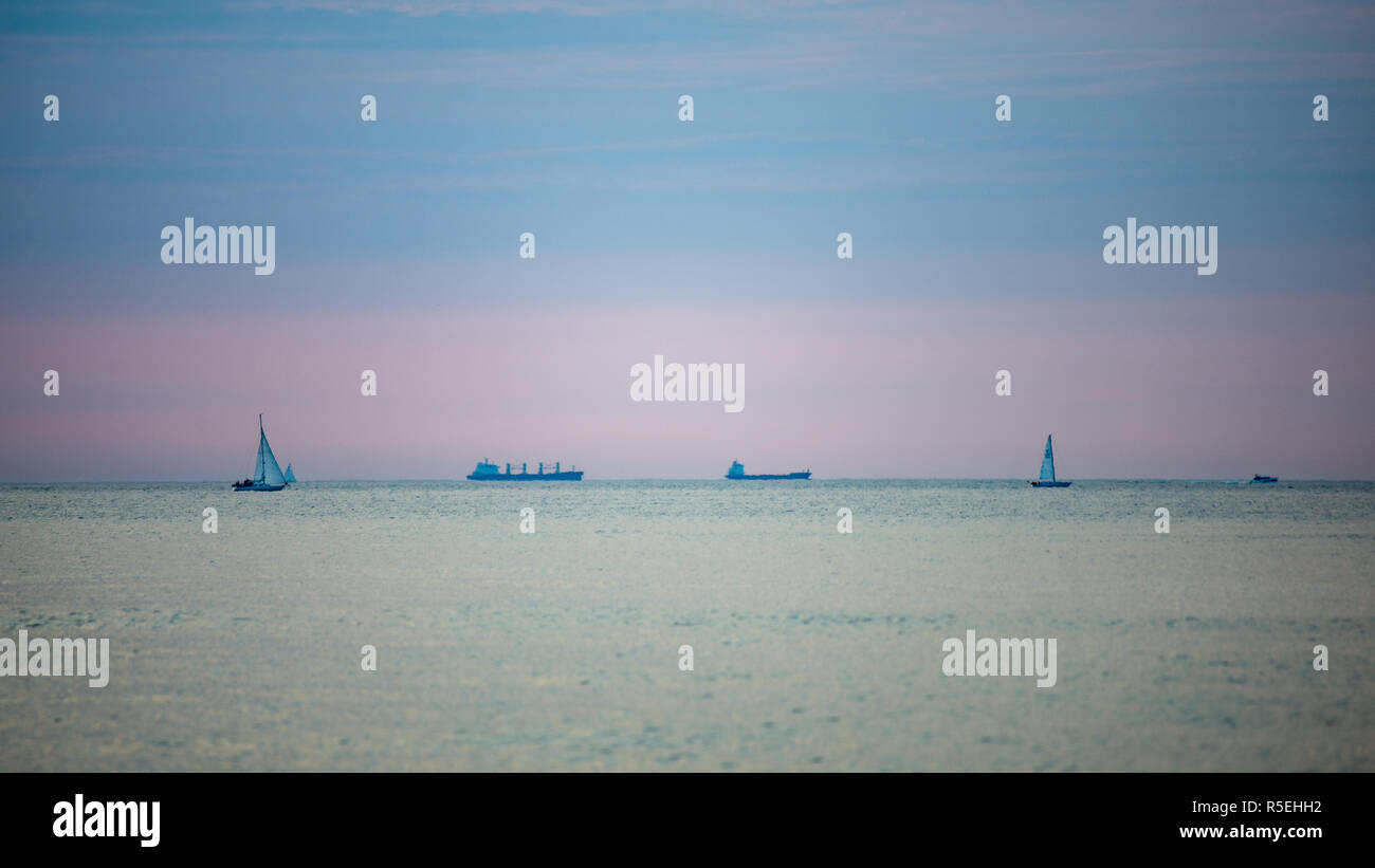 calm blue sunset over clear water in baltic sea. minimalistic image ...
