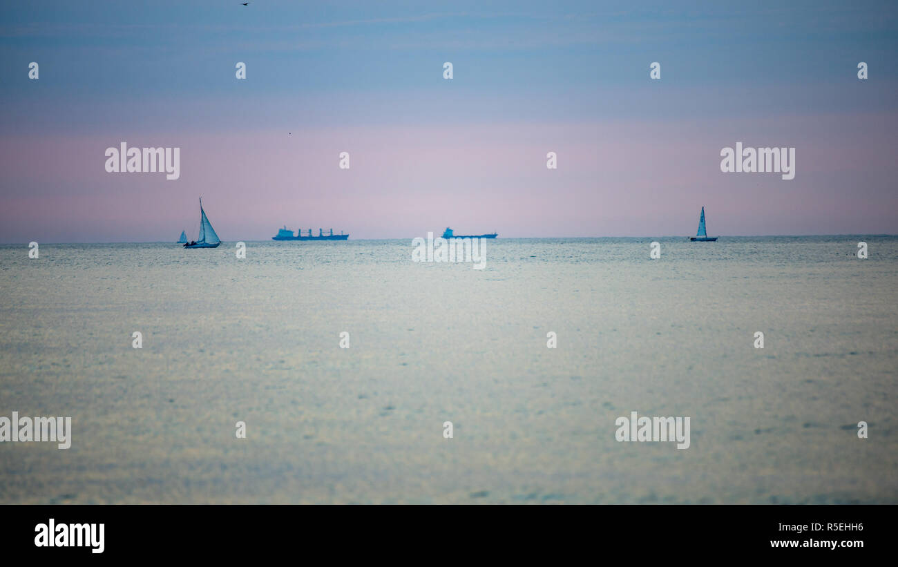 calm blue sunset over clear water in baltic sea. minimalistic image ...