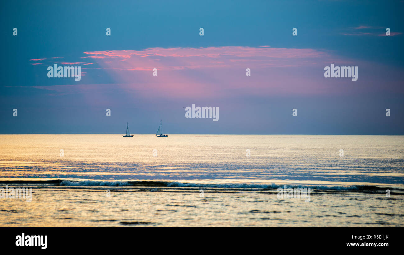 calm blue sunset over clear water in baltic sea. minimalistic image ...