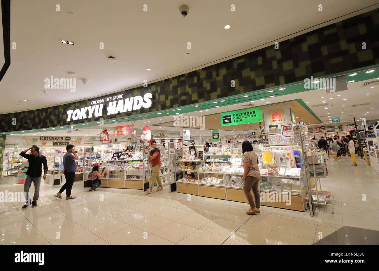 People visit Tokyu Hands department store in Singapore Stock Photo - Alamy