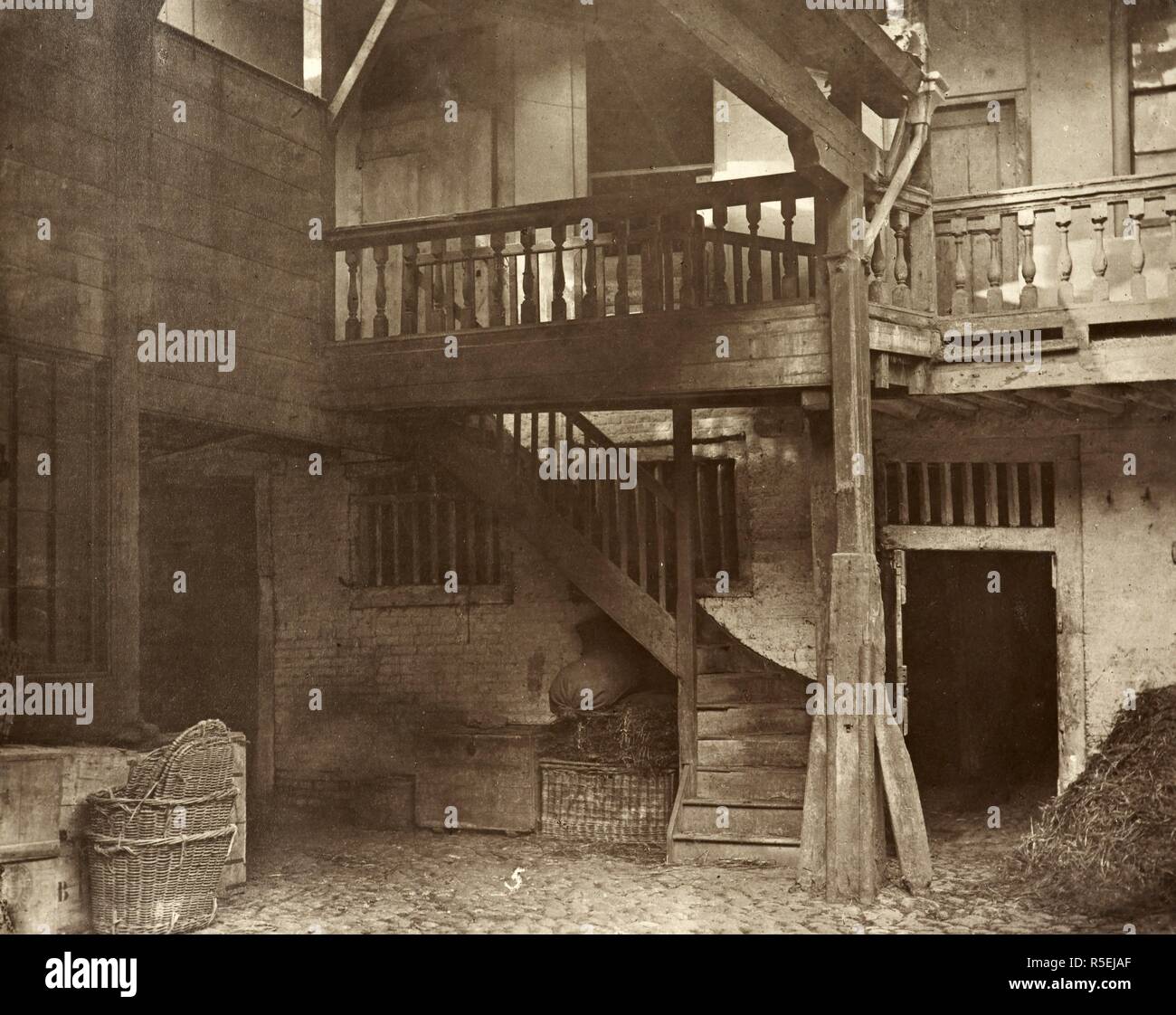 The Oxford Arms Inn. Staircase. One hundred and twenty plates with text ...