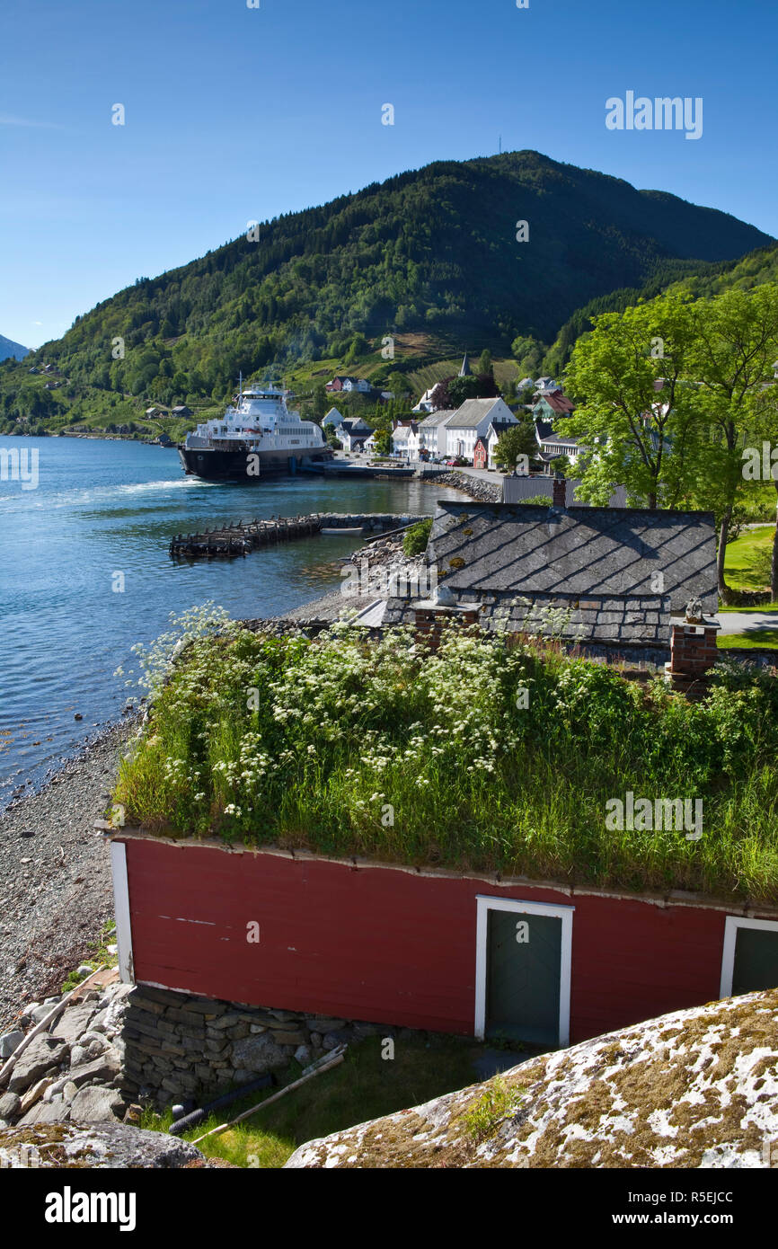 The picturesque village of Utne nestled into a little bay in the ...
