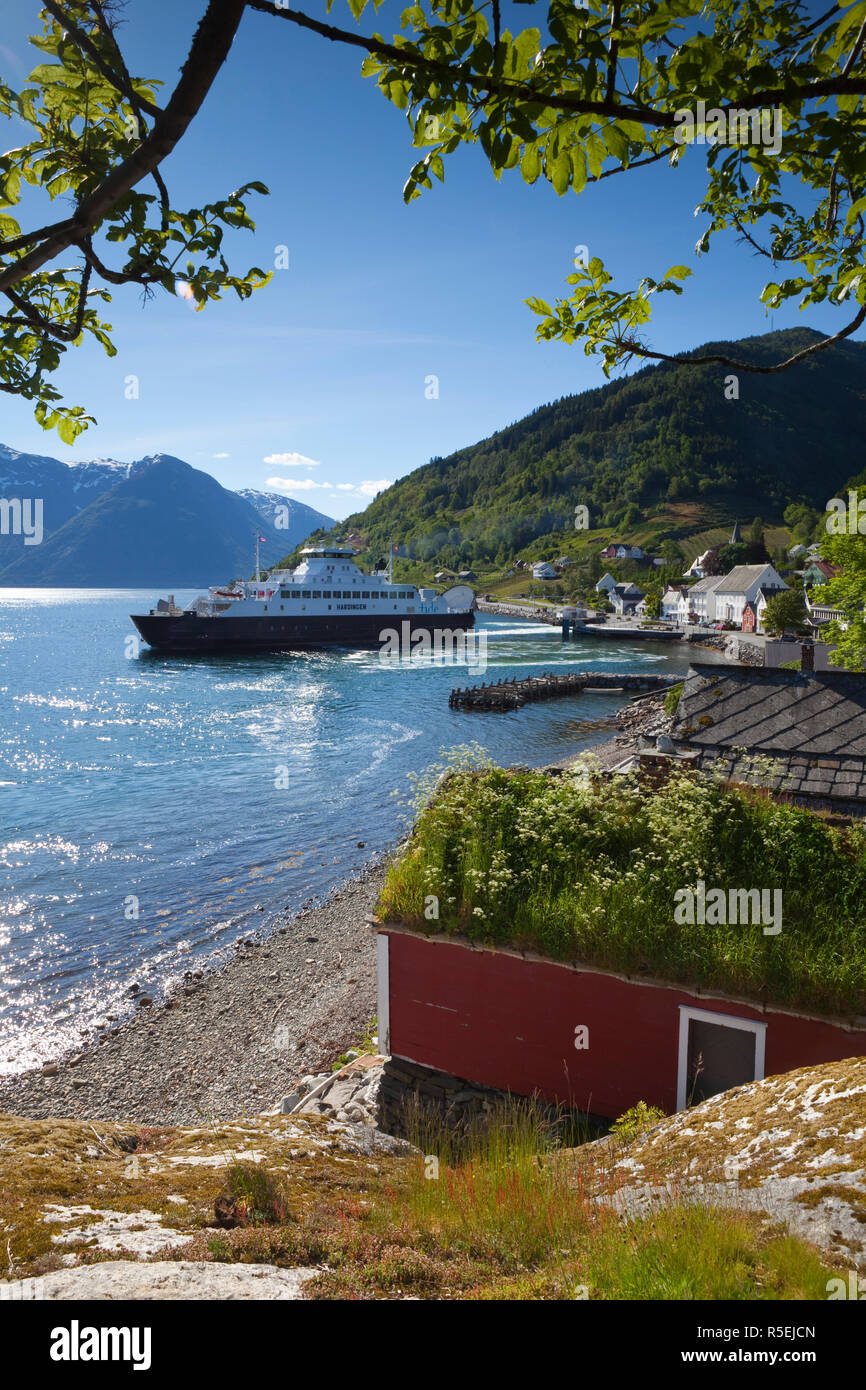 The picturesque village of Utne nestled into a little bay in the ...