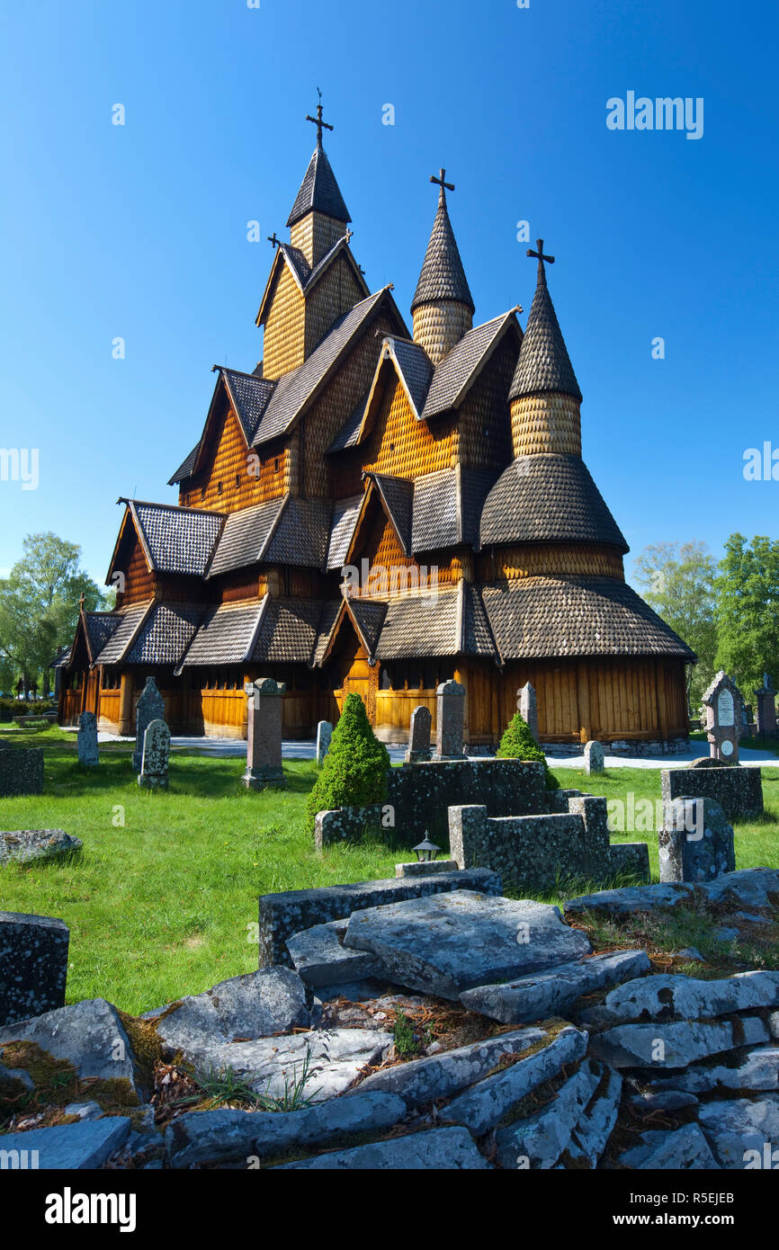 Tourists checking map beside Heddal Stave Church, Norway's largest ...