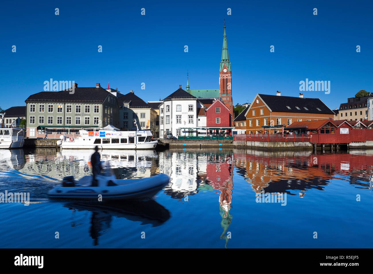 Wooden houses in Arendals Old Town reflected in harbour, Sorlandet ...